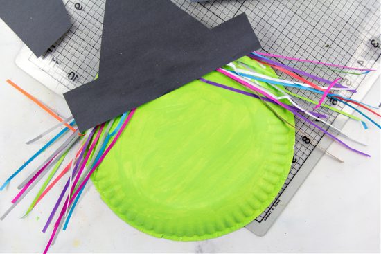 Make a Bright and Colorful Paper Plate Witch Mask - Make and Takes